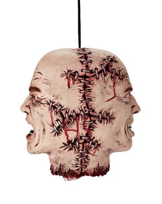 Stitched Faces Hanging Head - Spirithalloween.com