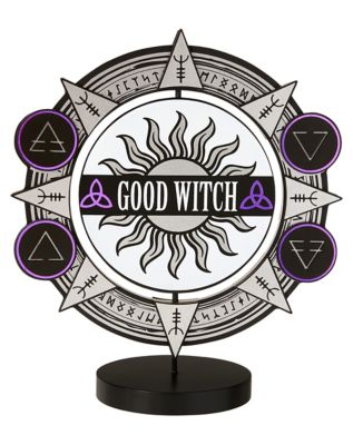 Spinning Bad Witch Good Witch Tabletop Sign - Spirithalloween.com