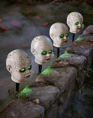Light-Up LED Cracked Doll Pathway Markers - Spirithalloween.com